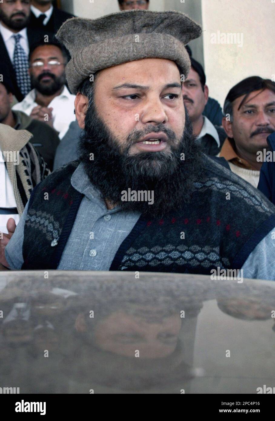 Sajad Ahmed Rana, center, father of Scottish girl Molly Campbell, also ...