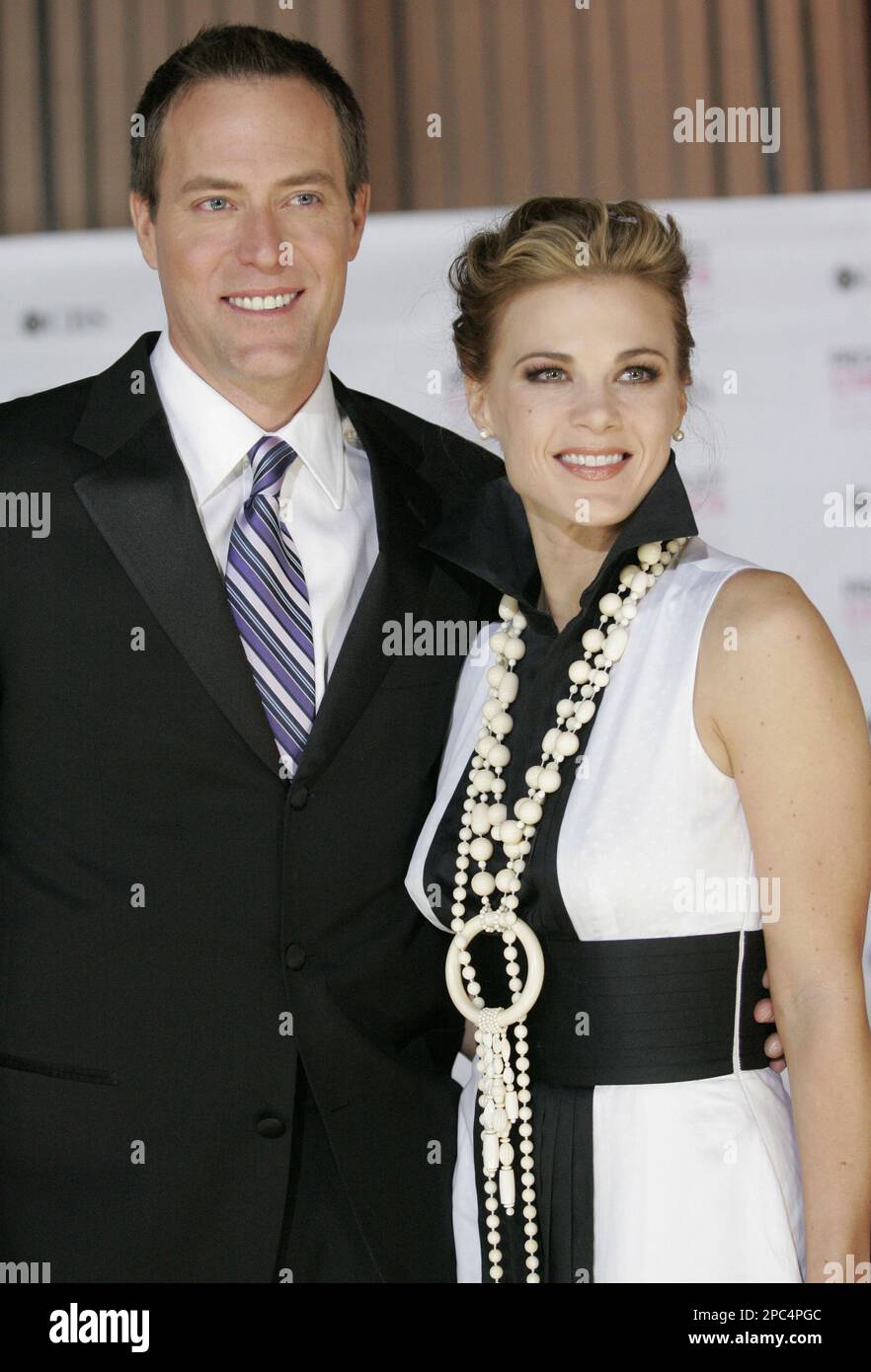 Rob Bogue, left, and Gina Tognoni arrive at the 33rd Annual People's ...