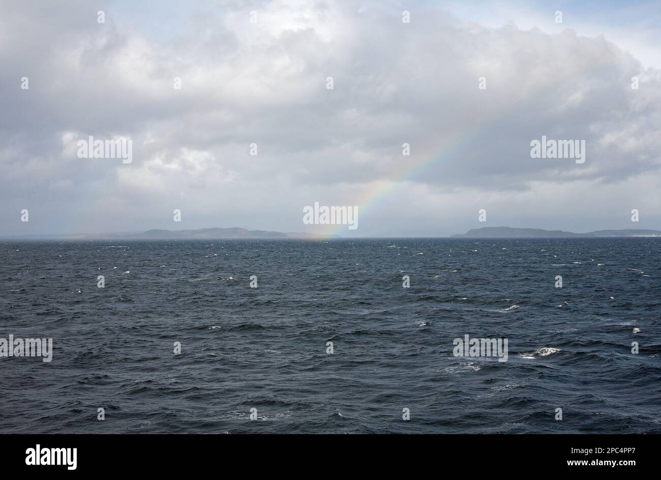 Rainbow The Forth of Clyde viewed from the ferry Caledonian Isles travelling between Brodick on ...