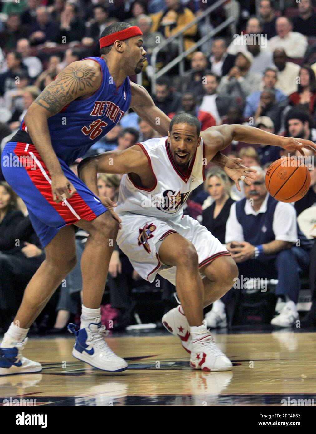 Detroit Pistons' Rasheed Wallace reaches around to tip the ball away from Philadelphia 76ers ...