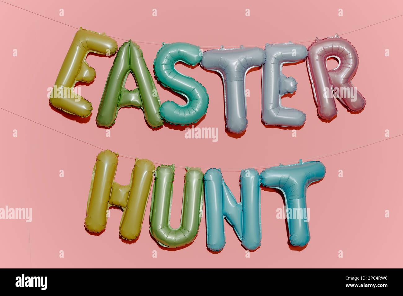 alphabet-shaped balloons of different colors forming the text easter ...