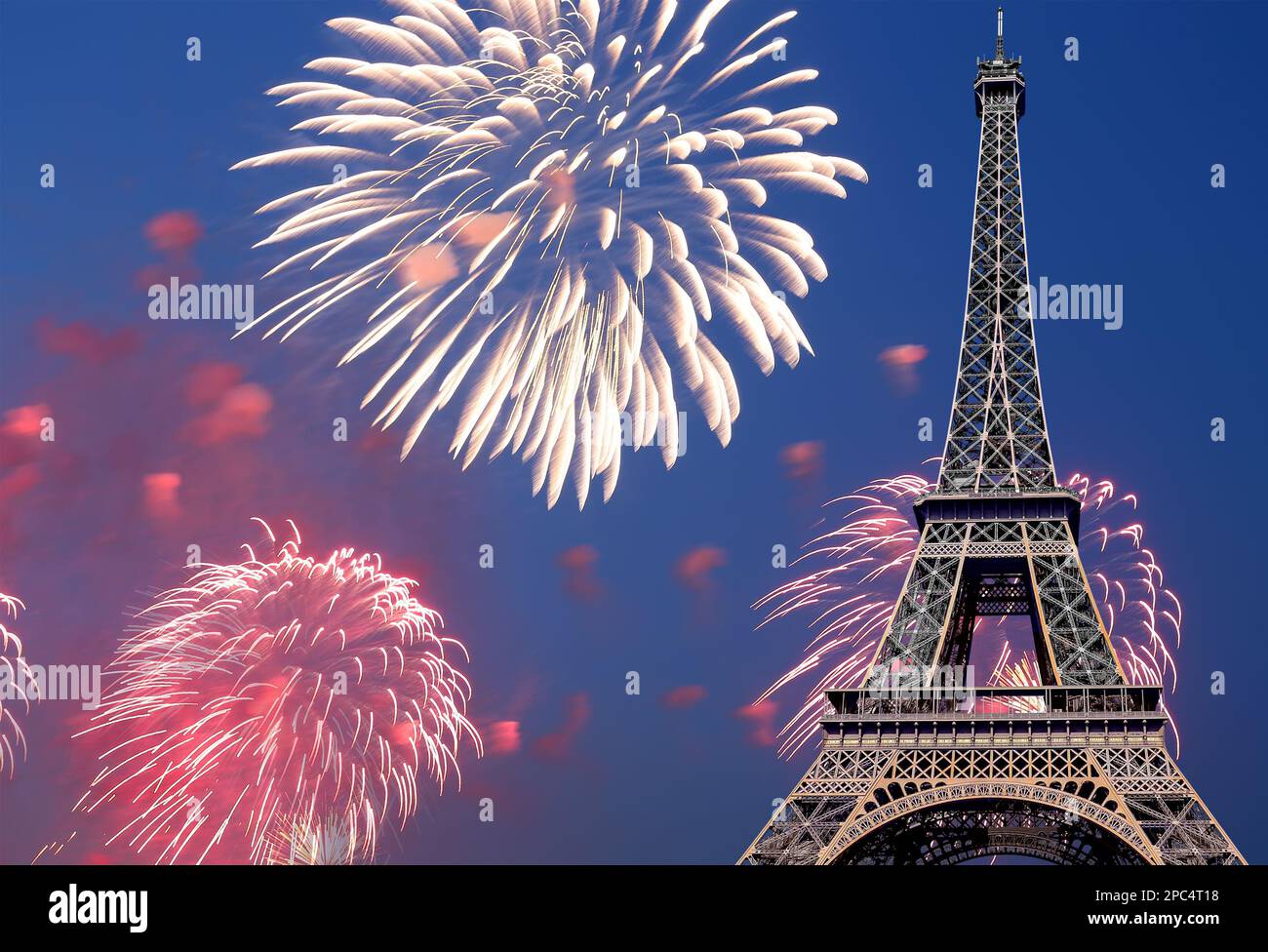 Celebratory colorful fireworks over the Eiffel Tower in Paris, France ...