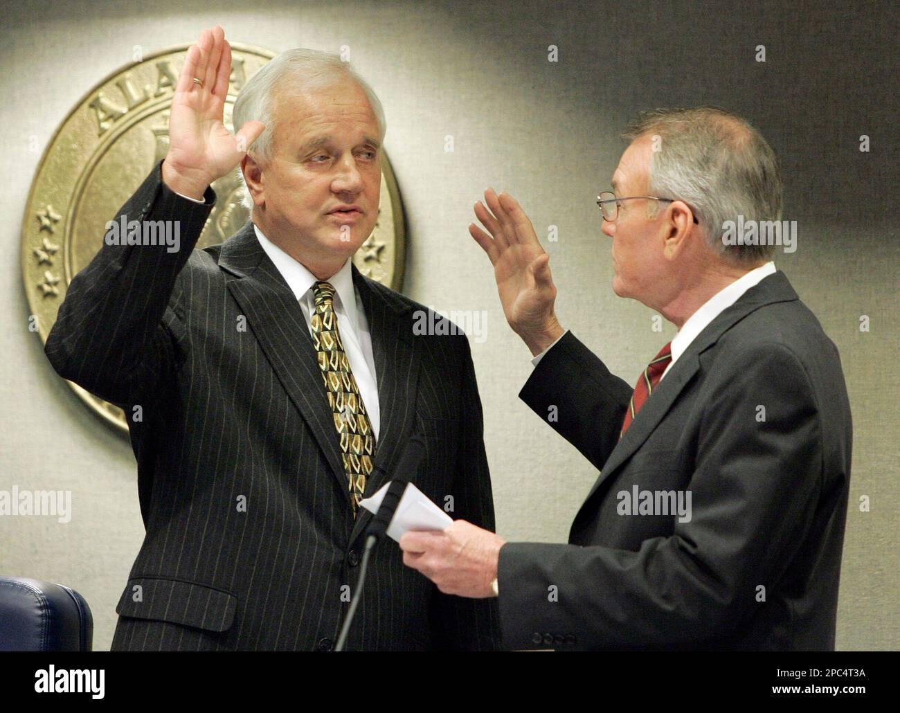 Sen. Hinton Mitchem, D-Union Grove, left, is sworn in as president pro ...