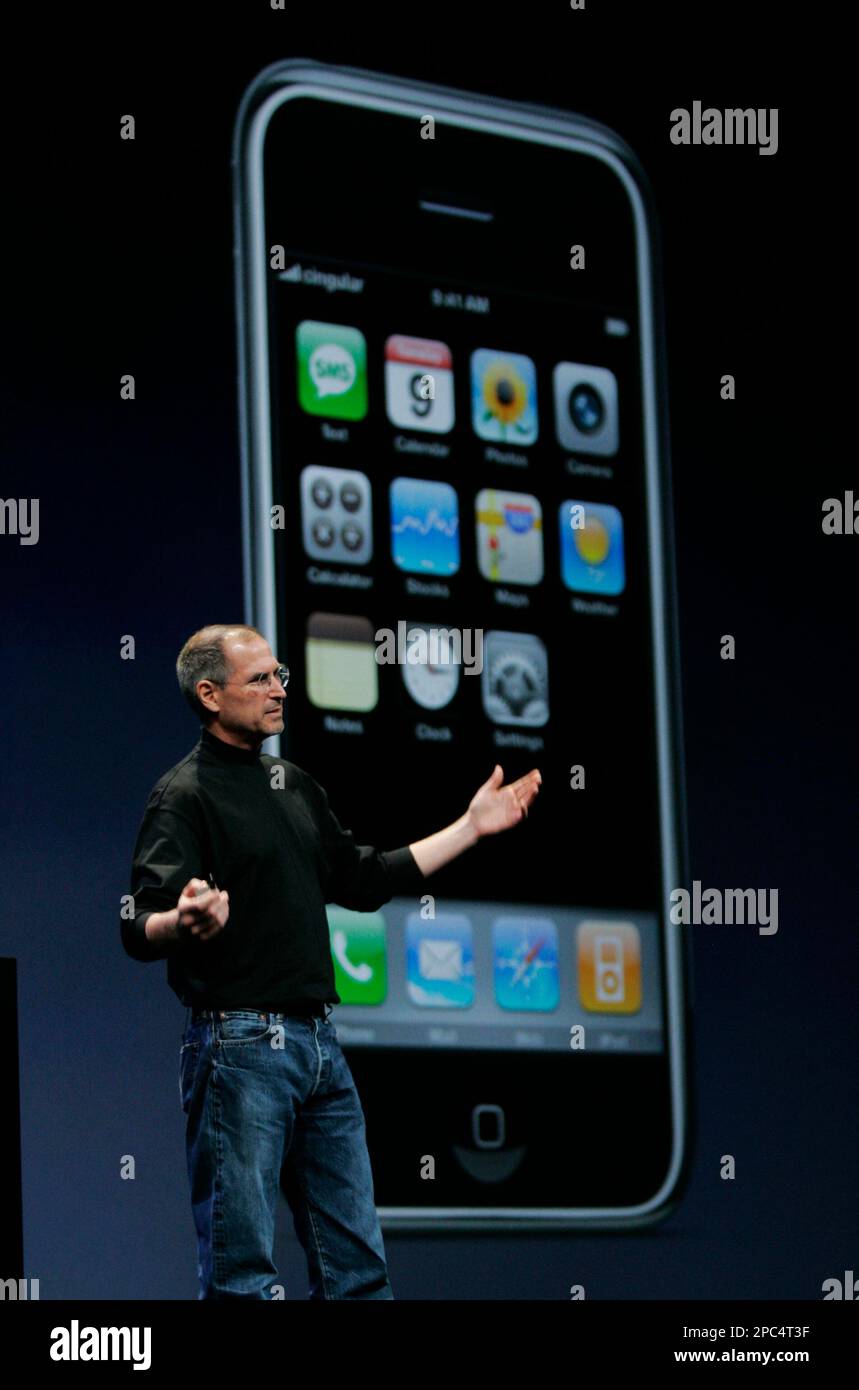 Apple CEO Steve Jobs shows off the new iPhone during his keynote ...