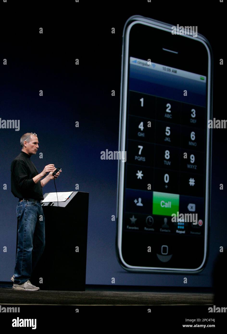 Apple CEO Steve Jobs demonstrates the new iPhone during his keynote ...