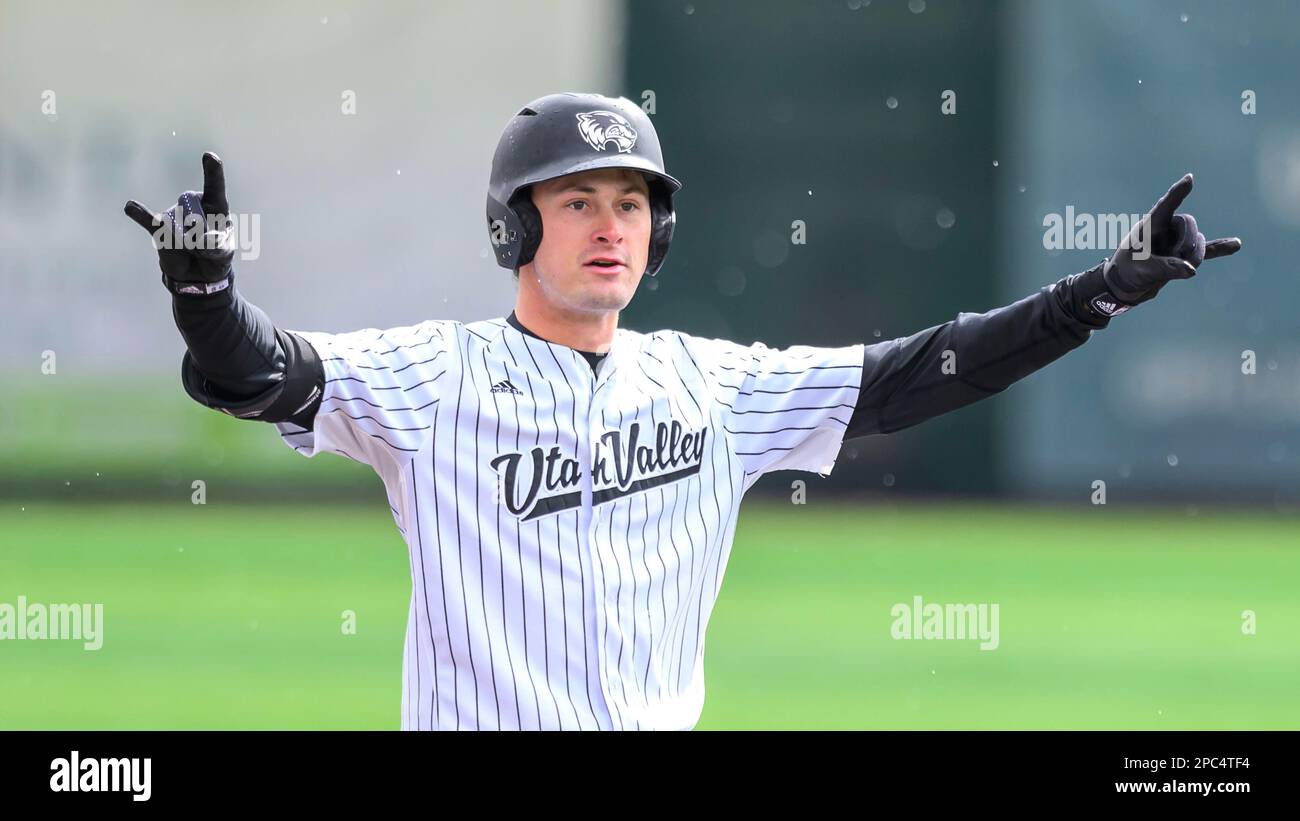 Utah Valley first baseman Patrick Mills (8) celebrates a double hit ...