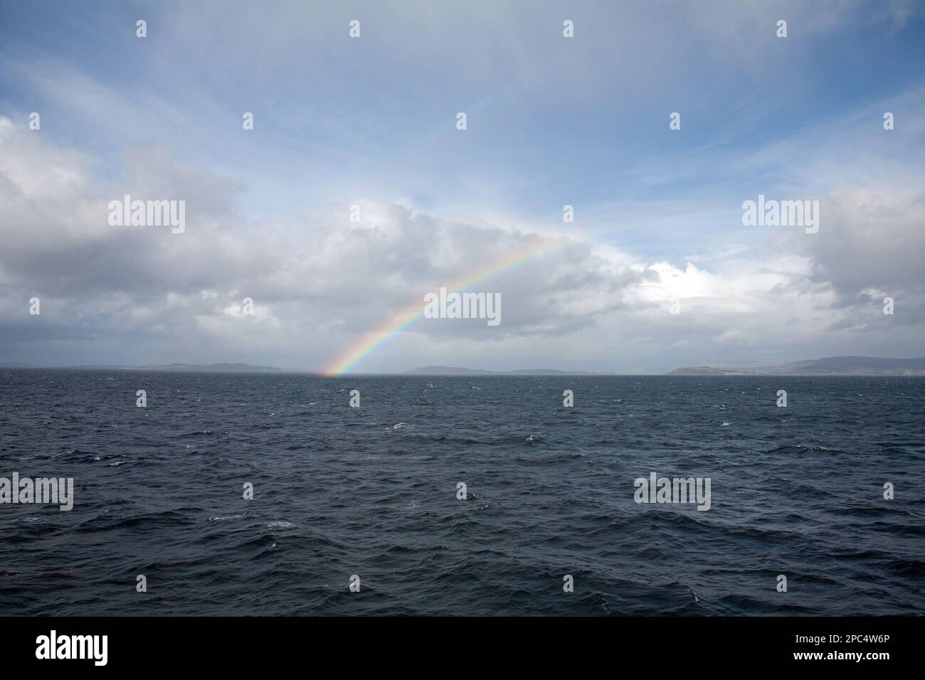 Rainbow The Forth of Clyde viewed from the ferry Caledonian Isles travelling between Brodick on ...