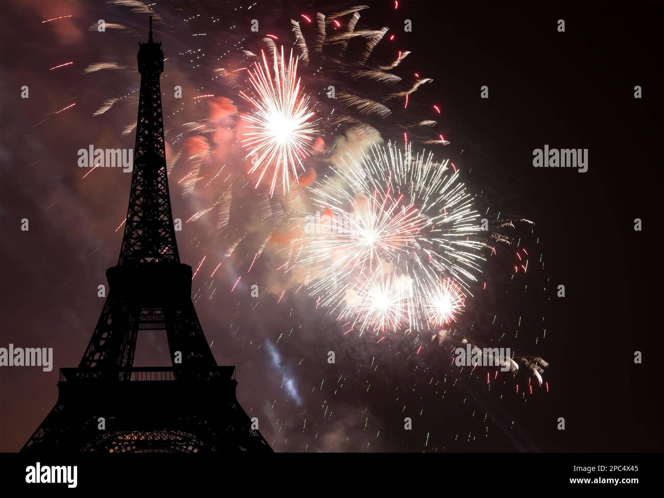 Celebratory colorful fireworks over the Eiffel Tower in Paris, France ...