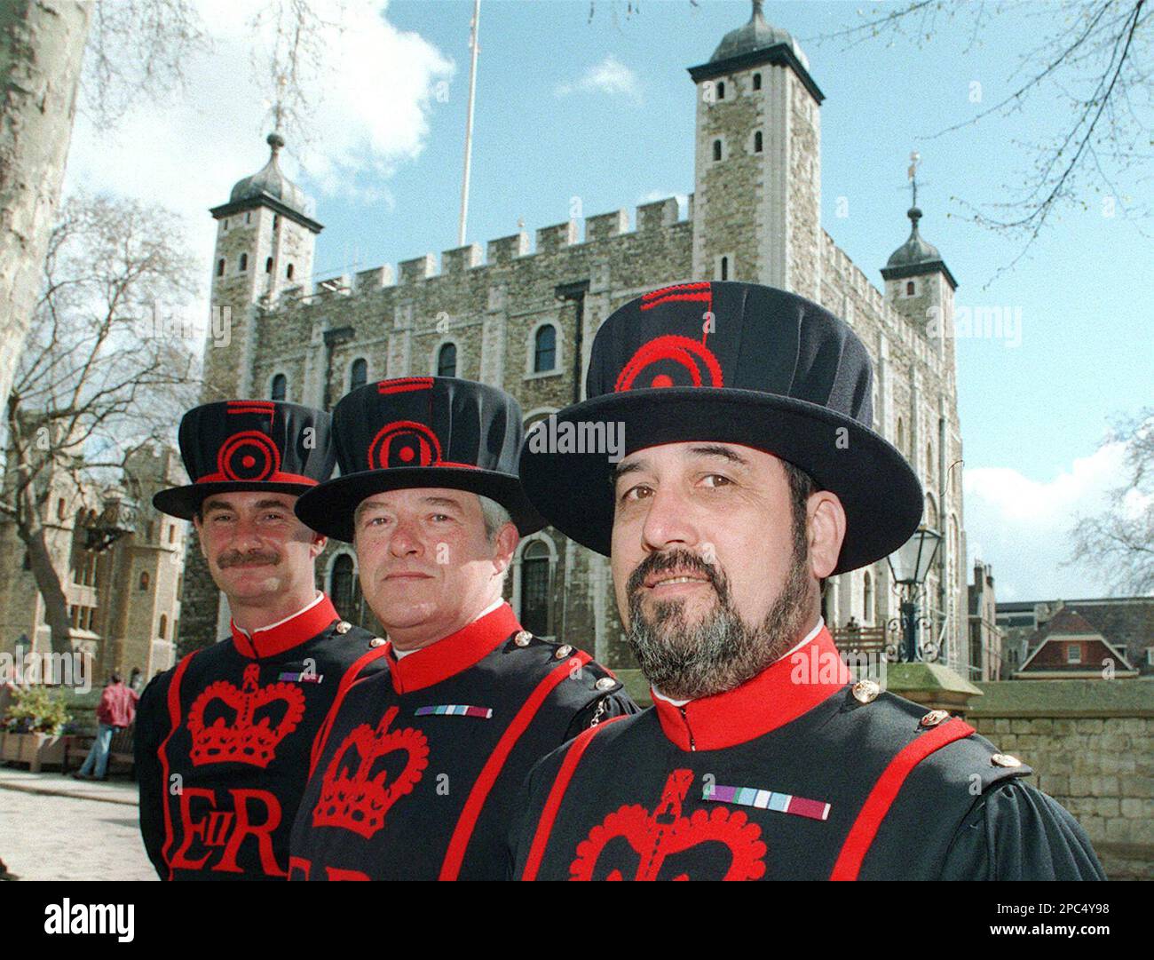 Three new Yeoman Warder recruits stand in front of the White Tower at ...