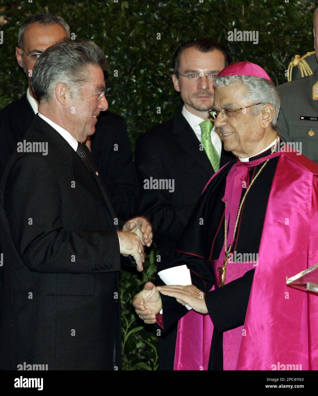 Austrian President Heinz Fischer prepares to shake hands with Apostolic ...