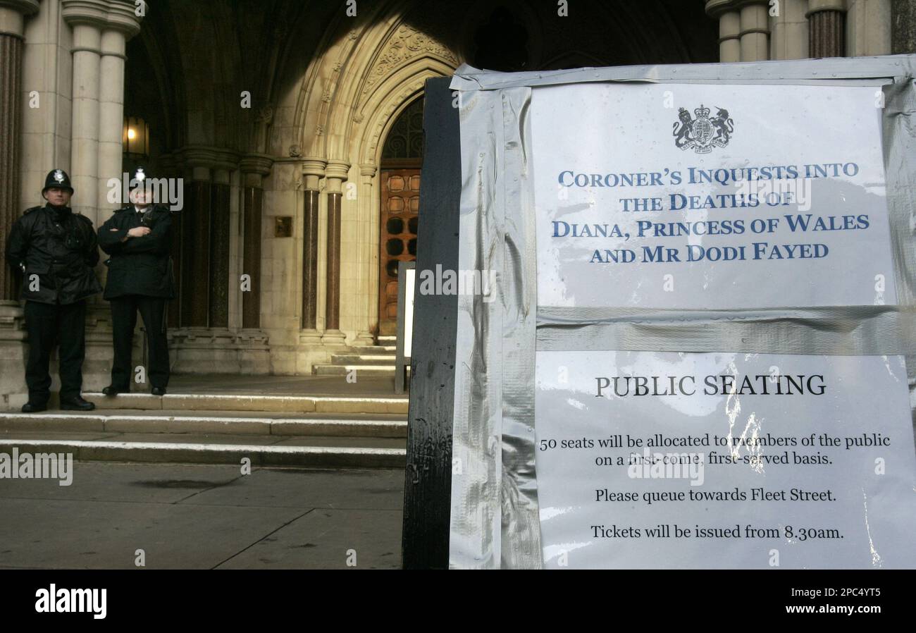 British police officers stand near a sign outside London's historic ...