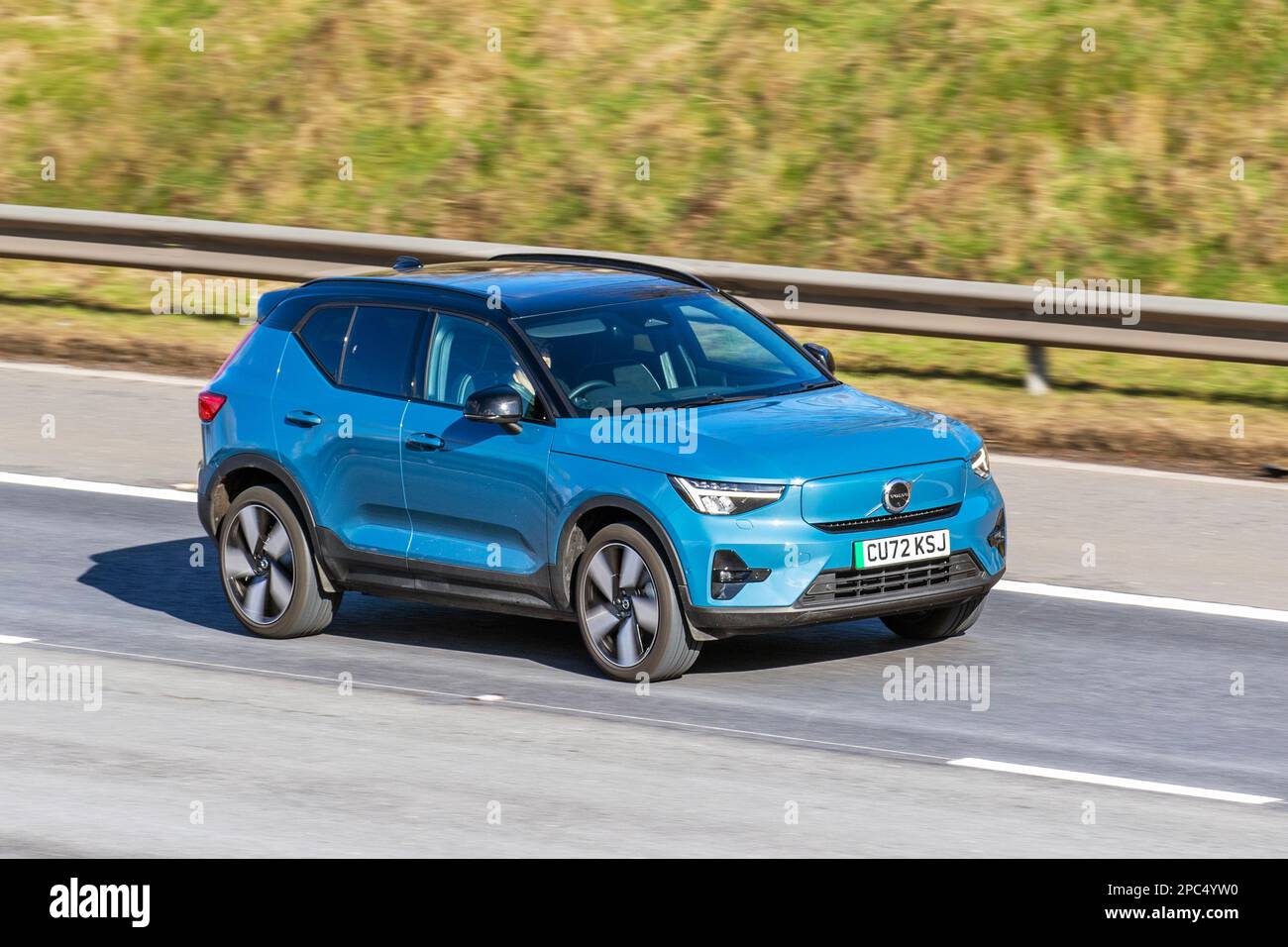 2022 Blue VOLVO XC40 Ultimate Recharge TWIN EV AWD; travelling on the ...