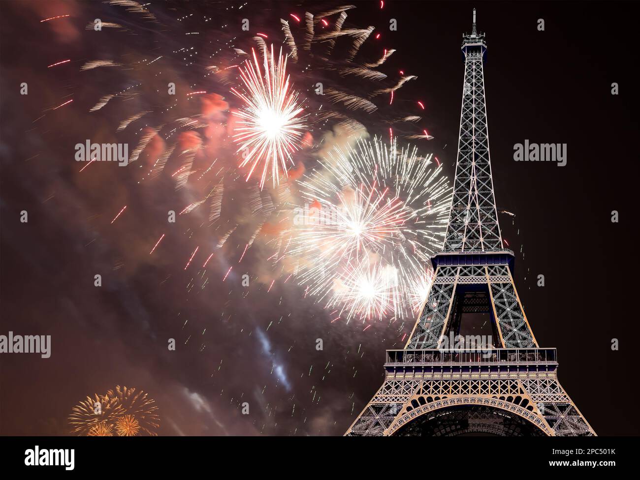 Celebratory colorful fireworks over the Eiffel Tower in Paris, France ...