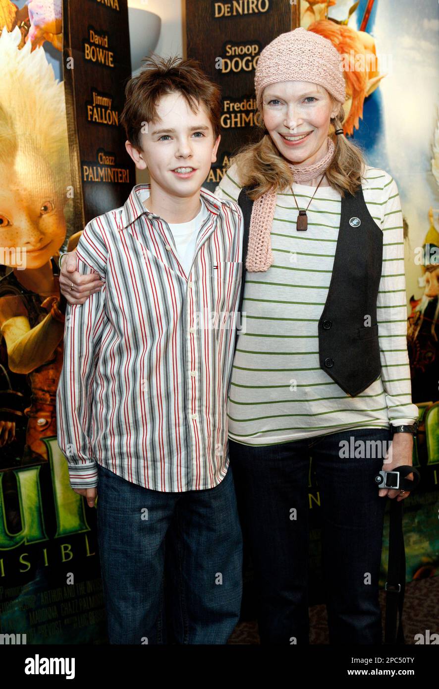 Actress Mia Farrow and co-star Freddie Highmore arrive to the premiere ...