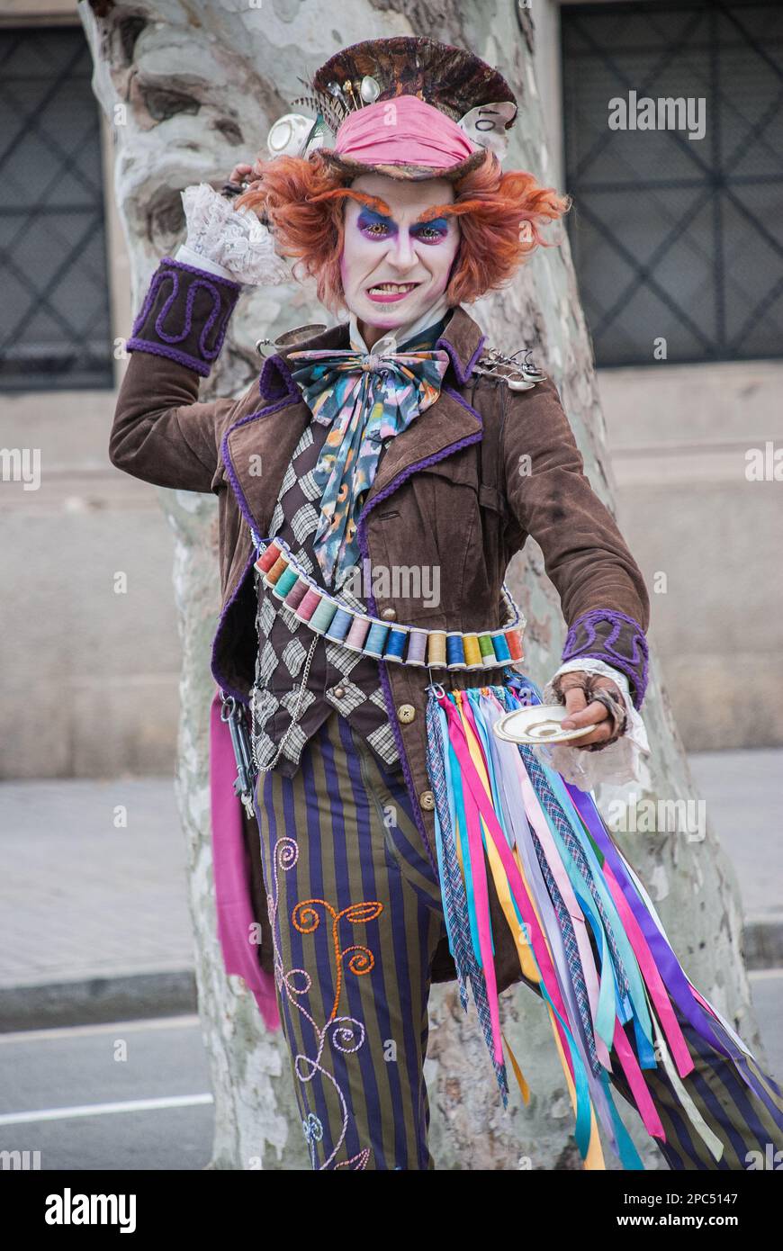 Street performer mime artist in Barcelona playing the role of 'The Mad ...