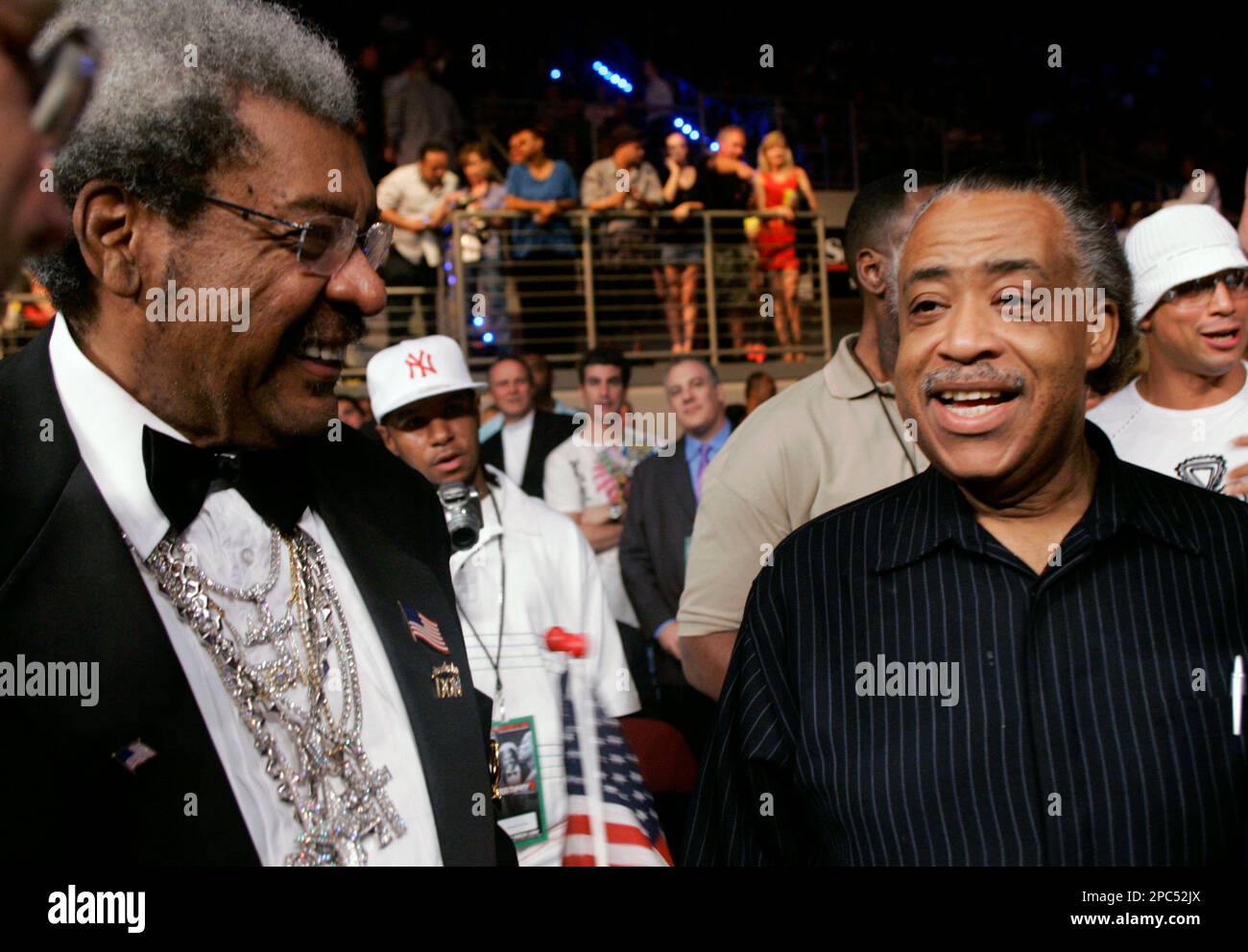 Boxing promoter Don King, left, and the Rev. Al Sharpton chat before a ...