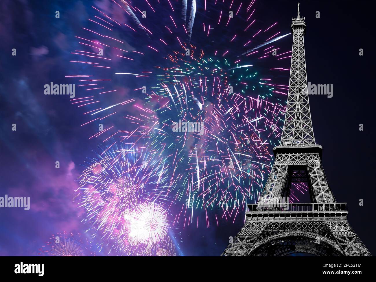 Celebratory colorful fireworks over the Eiffel Tower in Paris, France ...