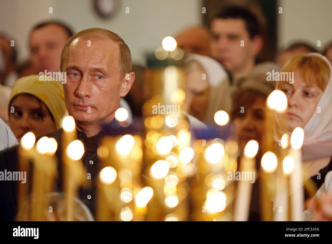 Russian President Vladimir Putin attends a Christmas service in a ...
