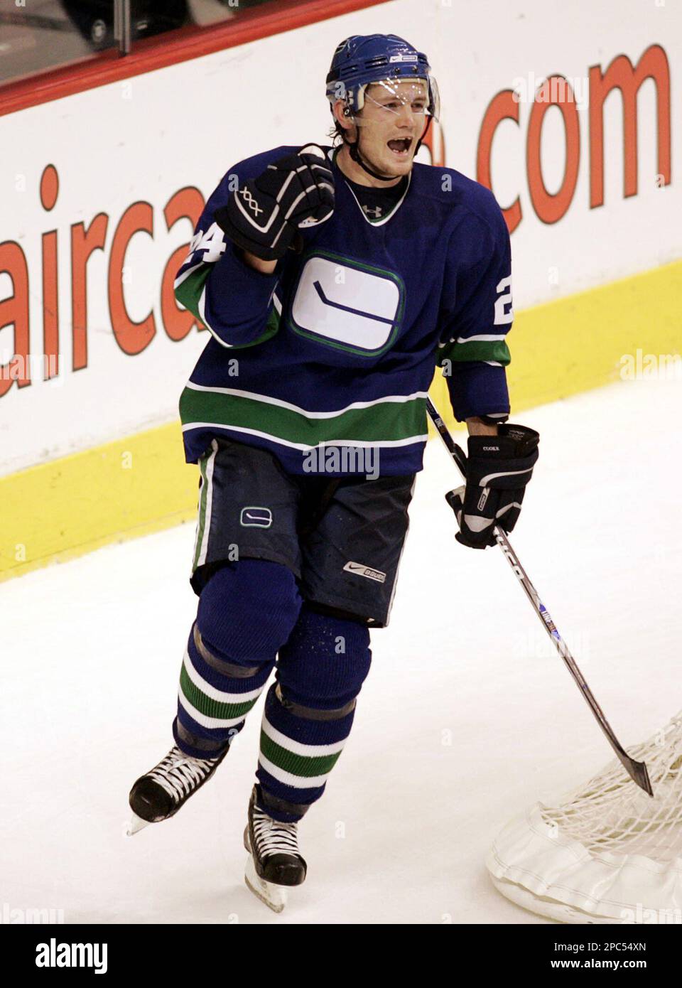 Vancouver Canucks' Matt Cooke celebrates his overtime goal to win the ...