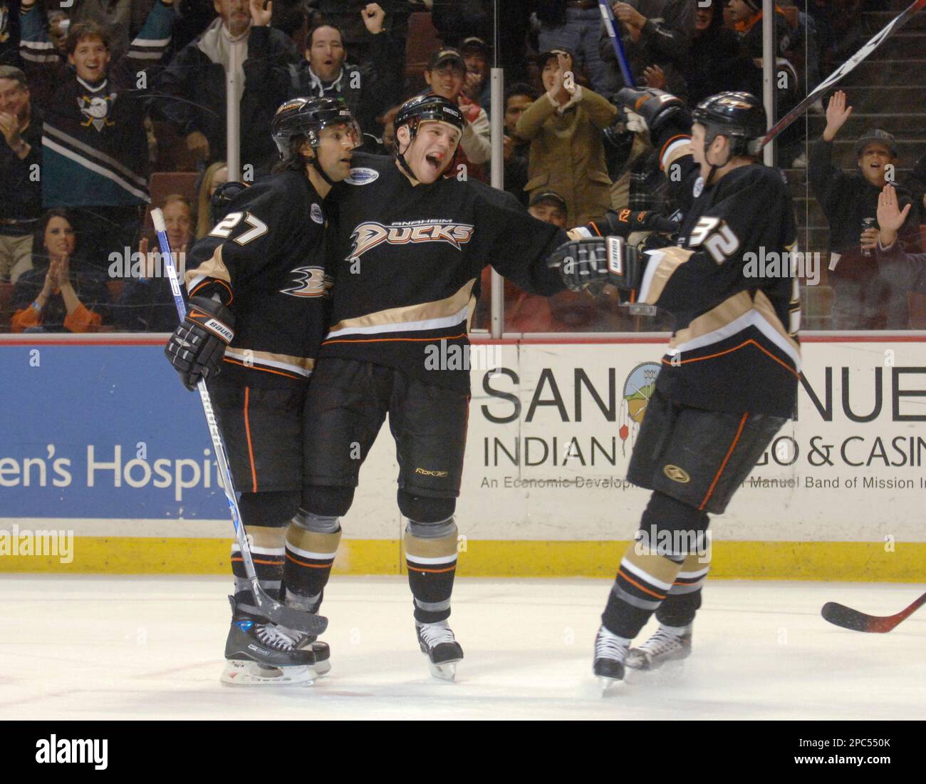 Anaheim Ducks' Scott Niedermayer, left, Shawn Thornton, center, and ...