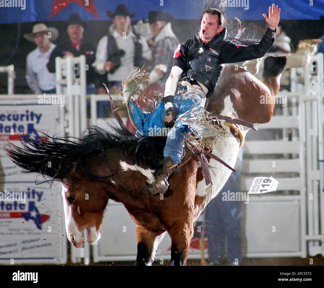 Bo Casper, of Fort Scott, Kan., holds on to Painted Valley as he ...