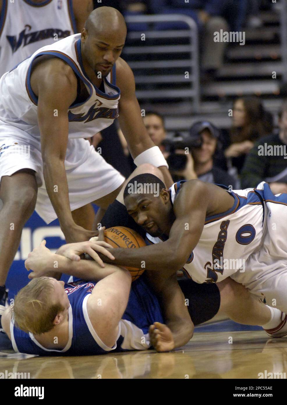 Washington Wizards' Gilbert Arenas (0) and Jarvis Hayes fight for the ...