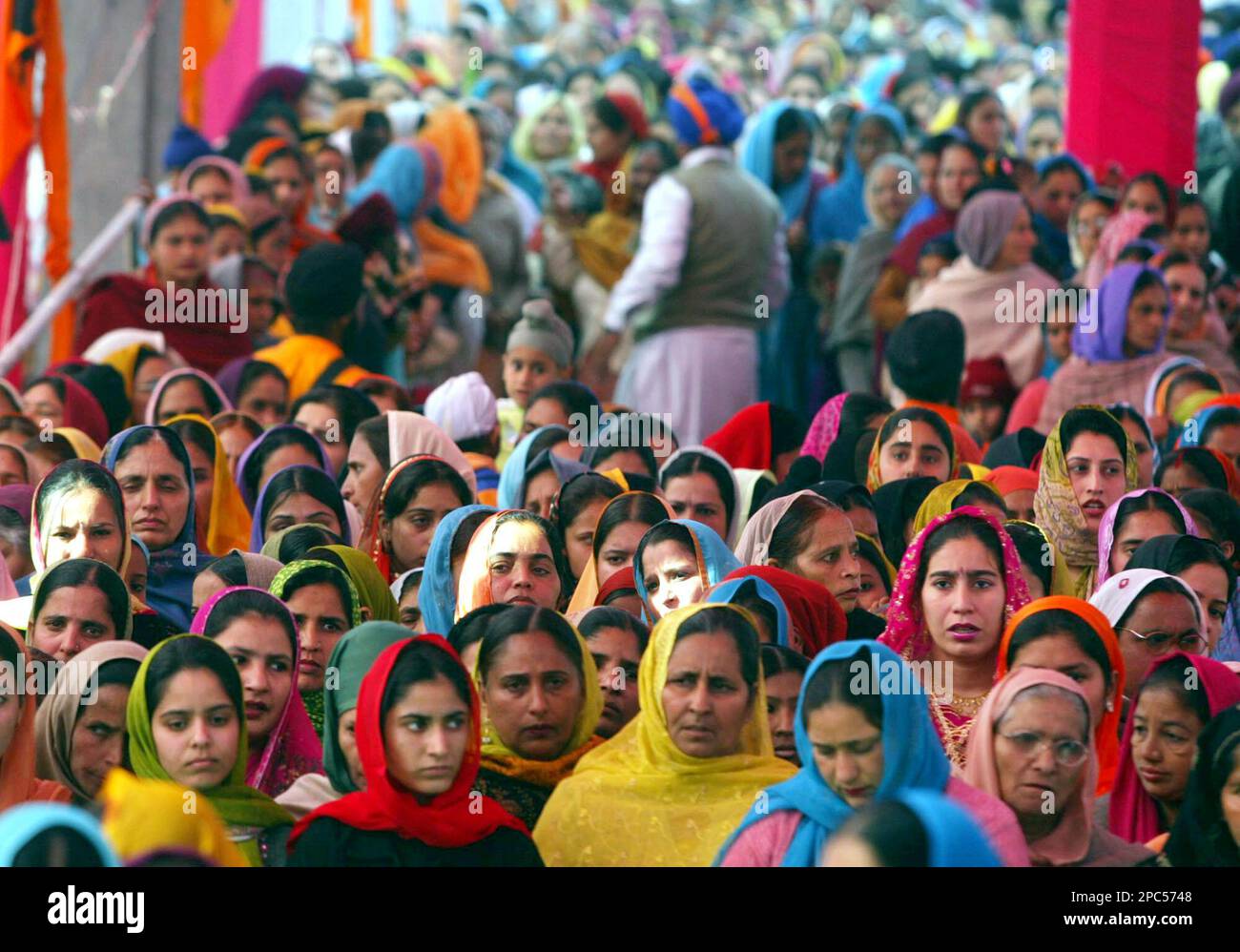 Sikh devotees pray at a religious congregation at a Sikh temple in ...