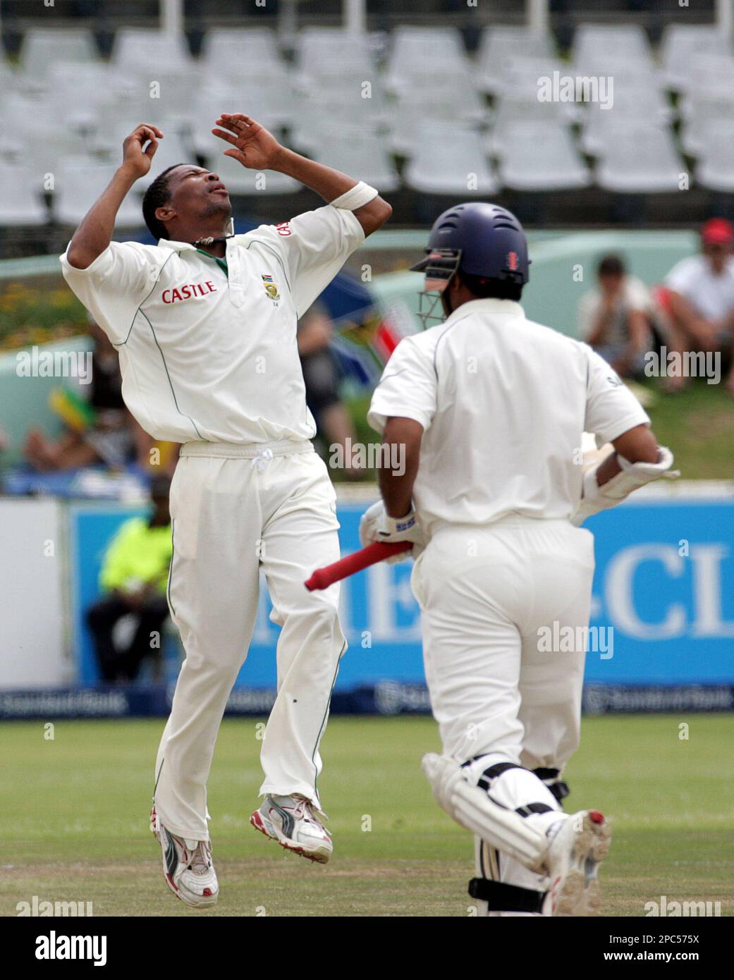 South Africa's bowler Makhaya Ntini, left, reacts to runs being made ...