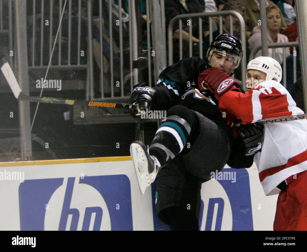 San Jose Sharks center Patrick Marleau, left, collides with Detroit Red ...