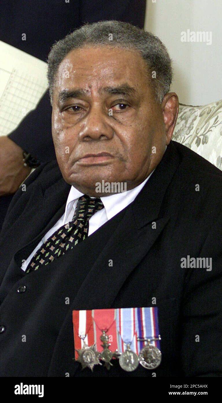 ** FILE ** Fiji's new President Ratu Josefa Iloilo takes a seat after ...