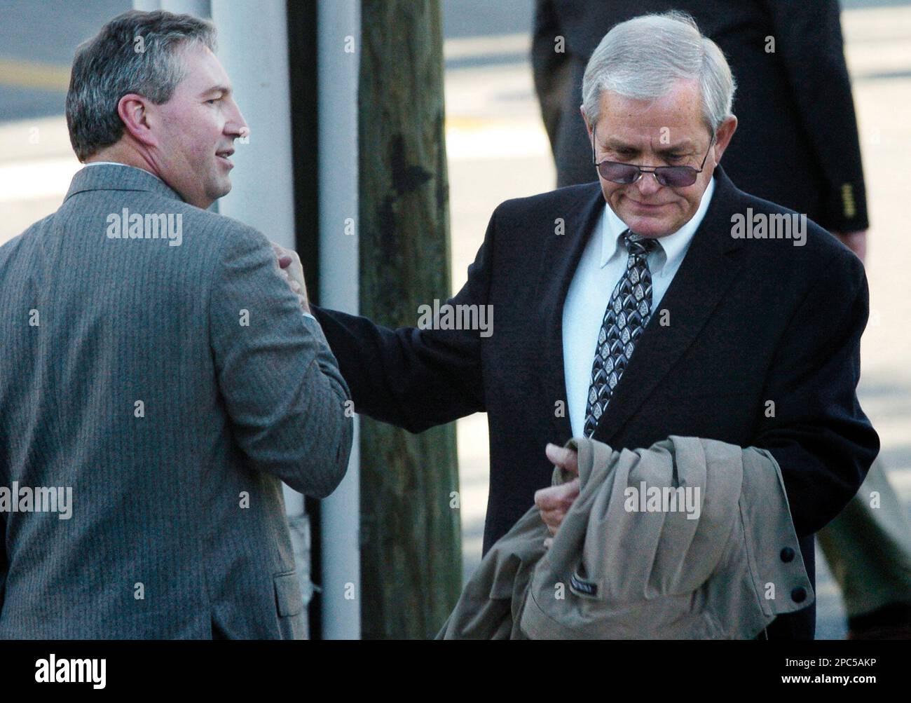 John Alvis Jackson, former president and CEO of Burruss Company, right ...