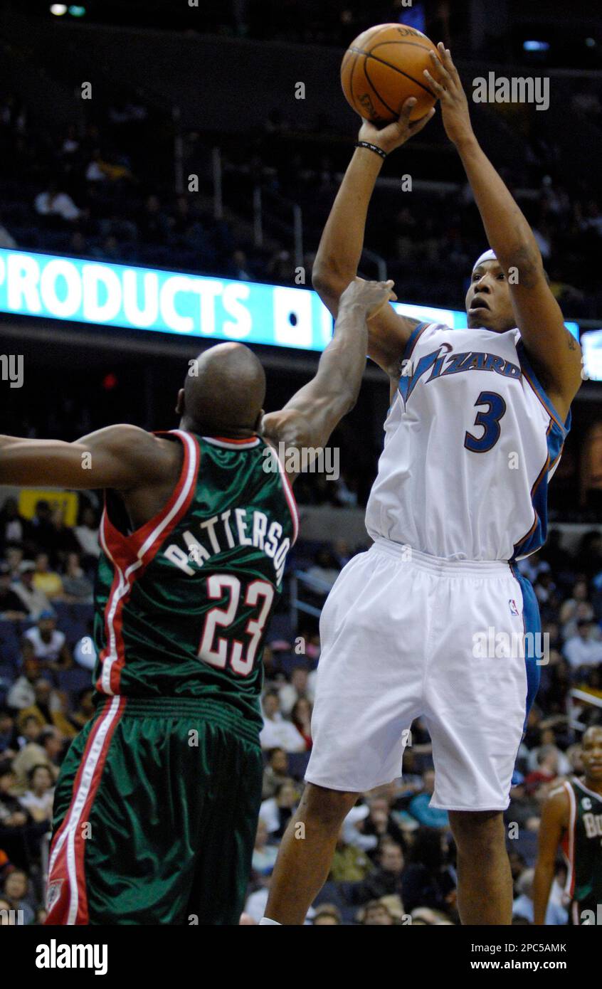 Washington Wizards' Caron Butler (3) shoots over Milwaukee Bucks' Ruben ...