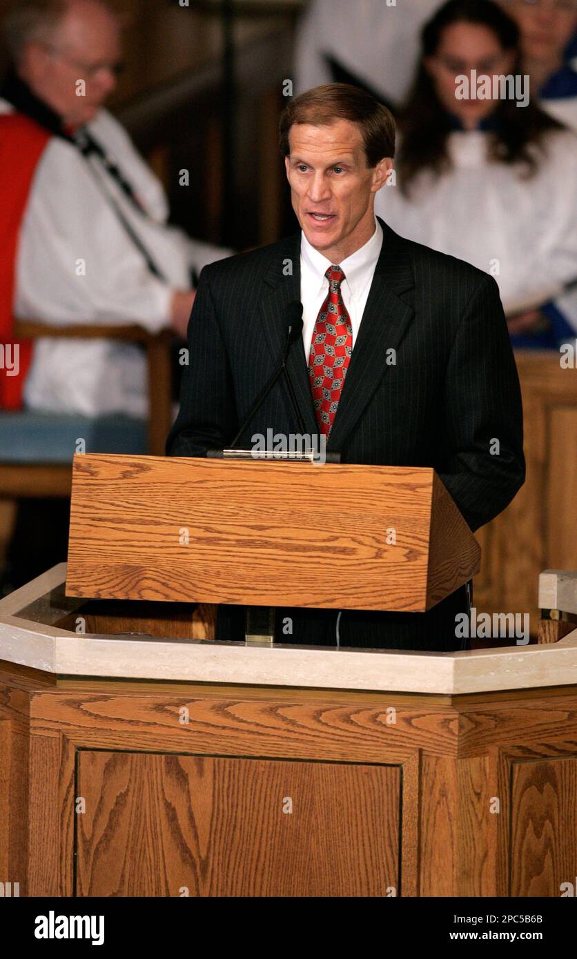 Michael Ford reads a passage from scripture at the funeral of his ...