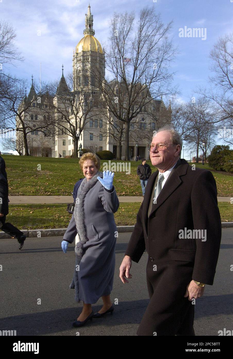 Gov. M. Jodi Rell, left, walks past the Capitol with her husband Lou ...