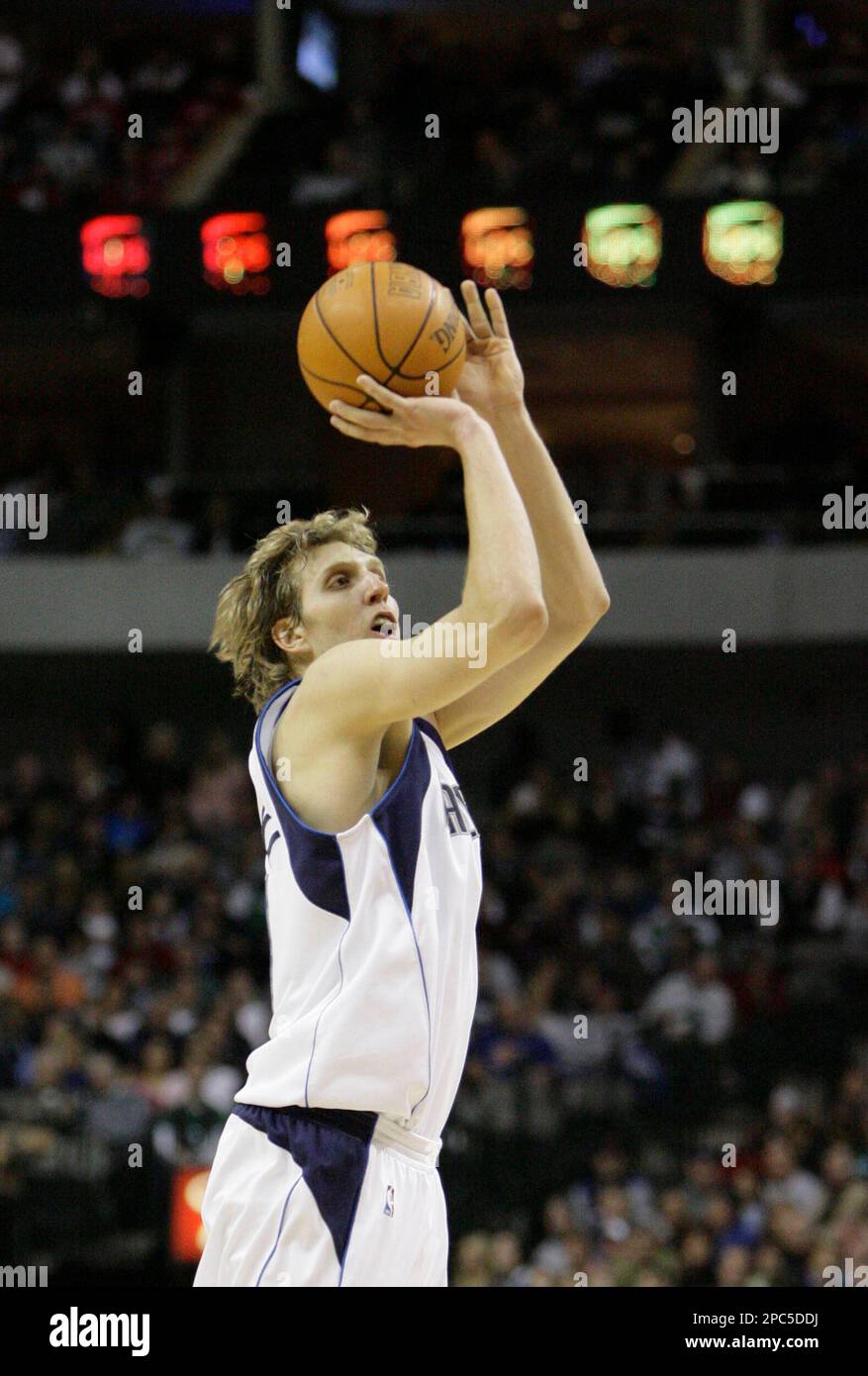 Dallas Mavericks forward Dirk Nowitzki, of Germany,goes up for a three ...