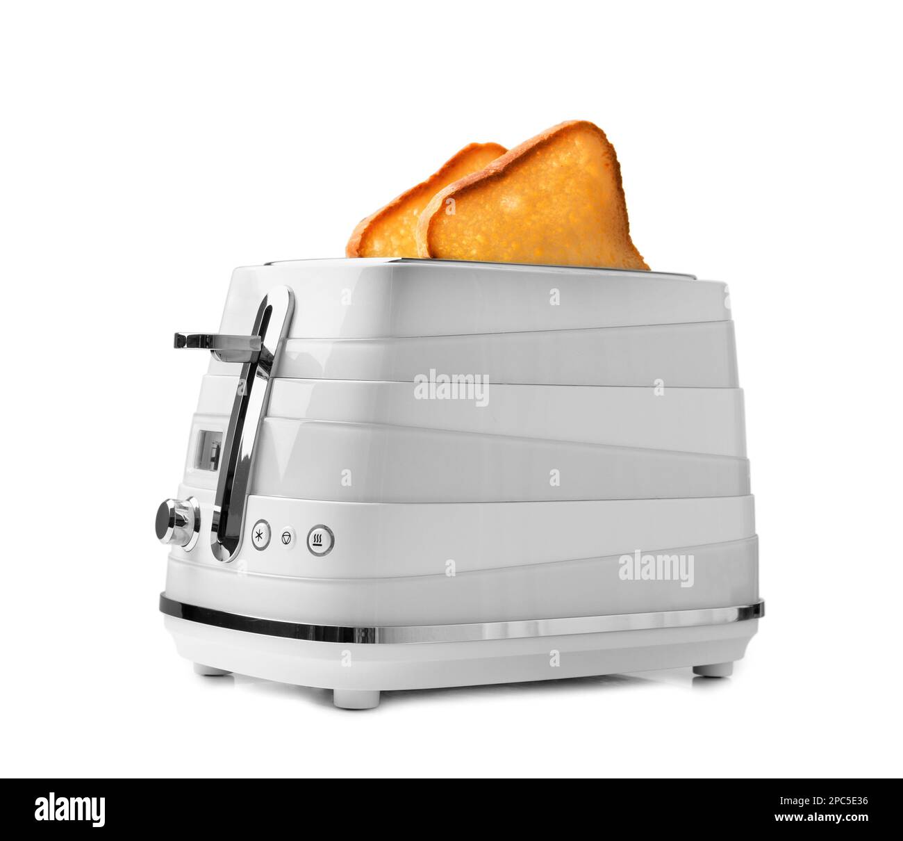 Toaster with slices of bread. Fried bread in a toaster. Appliances for the kitchen. Modern ...