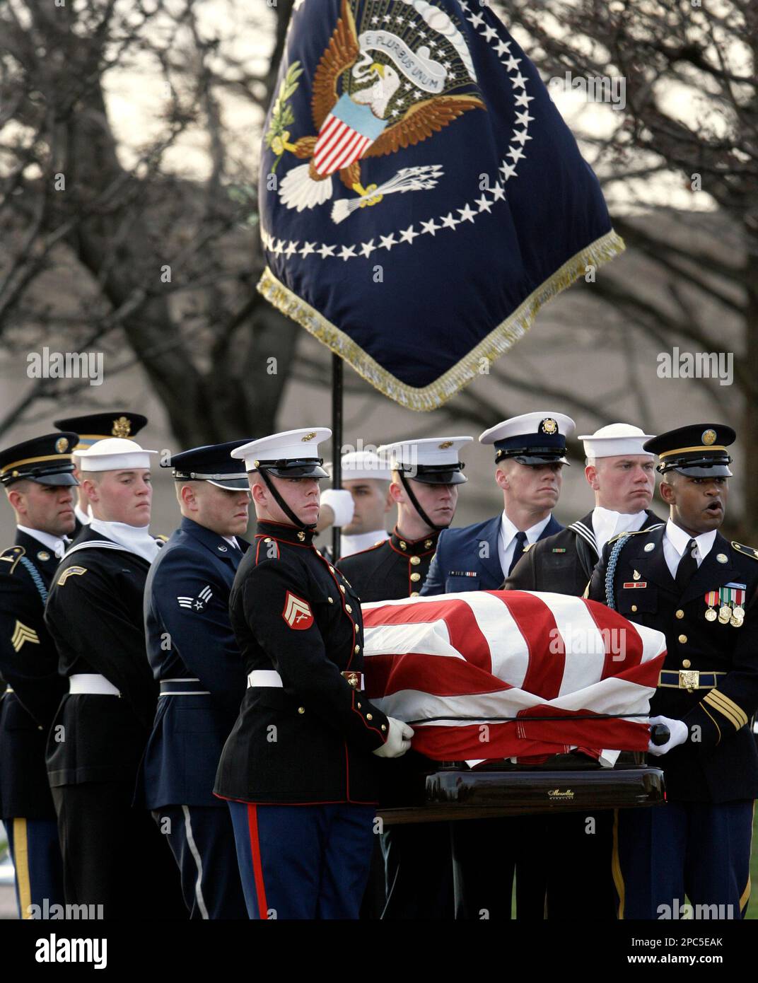 Former President Gerald R. Ford's casket is carried into the Gerald R ...