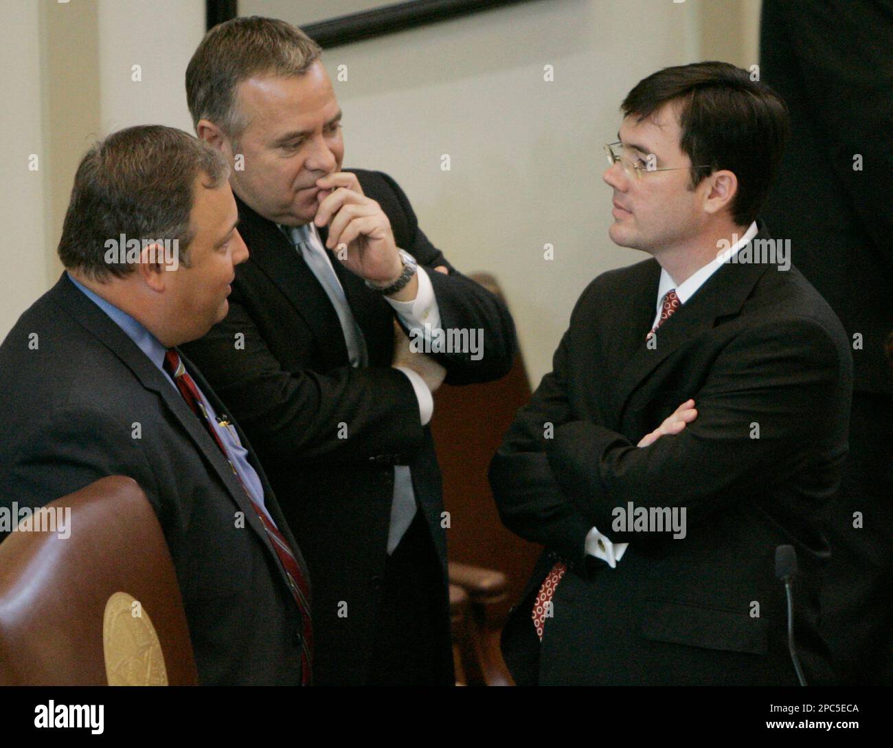 Sen. Mike Morgan, D-Stillwater, center, Sen. Glenn Coffee, R-Oklahoma ...