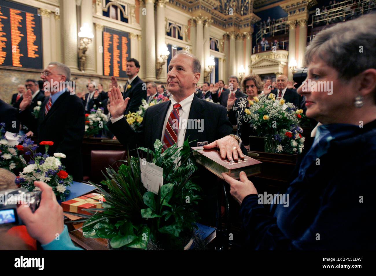 Rep. David J. Steil, R-Bucks, with his hand on the Bible held by his ...