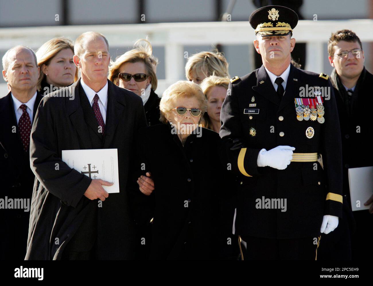 Betty Ford watches with her son Steven Ford, left, and Maj. Gen. Guy C ...