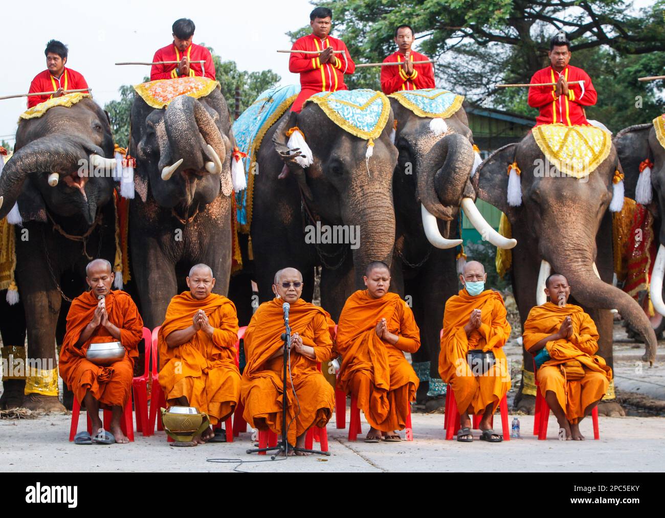 Ayutthaya, Thailand. 13th Mar, 2023. Buddhist monks pray in front of ...