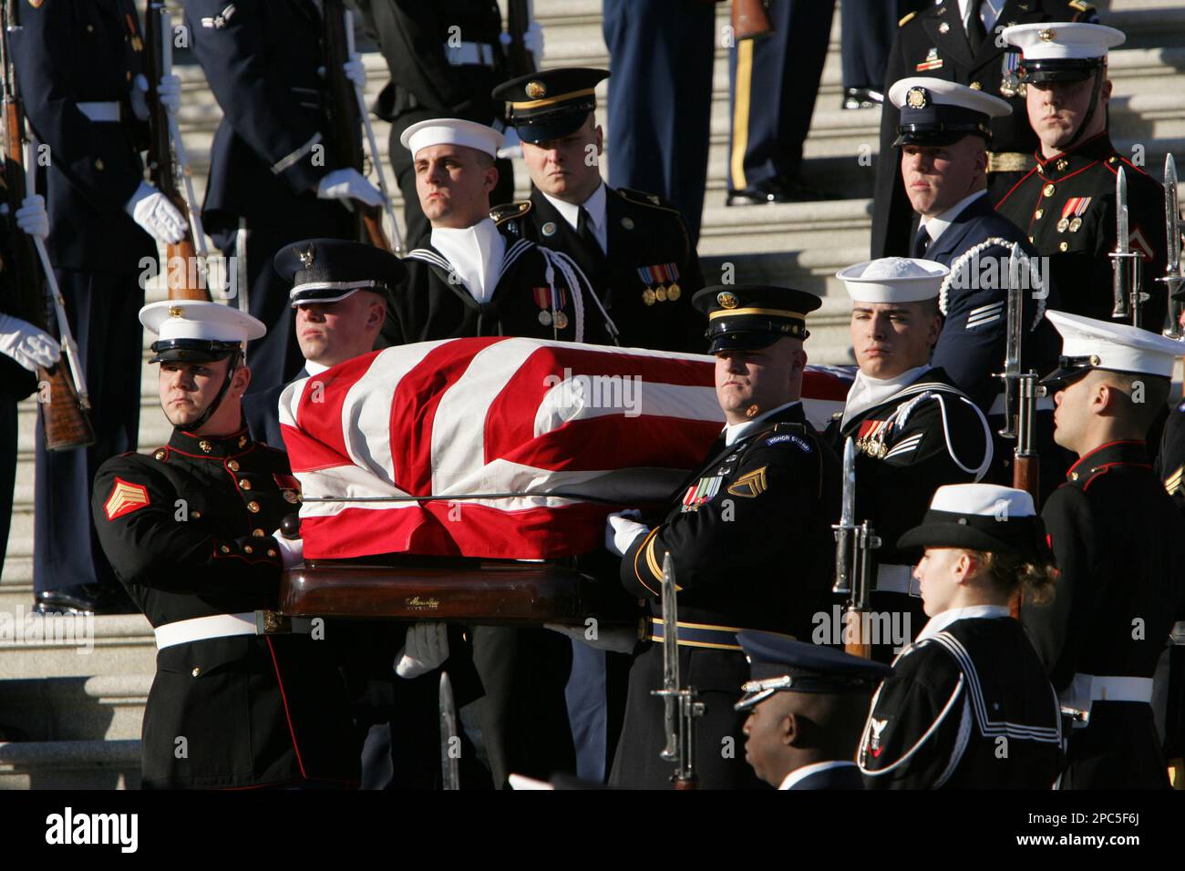 Former President Gerald Ford's casket is carried from the Capitol in ...