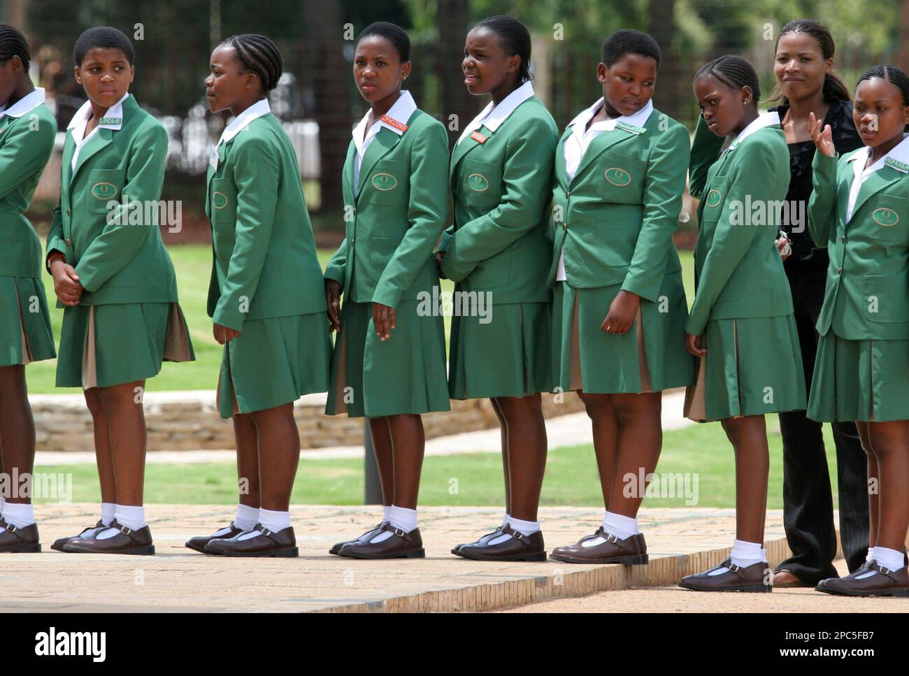 Students attend the opening of the Oprah Winfrey Leadership Academy for ...