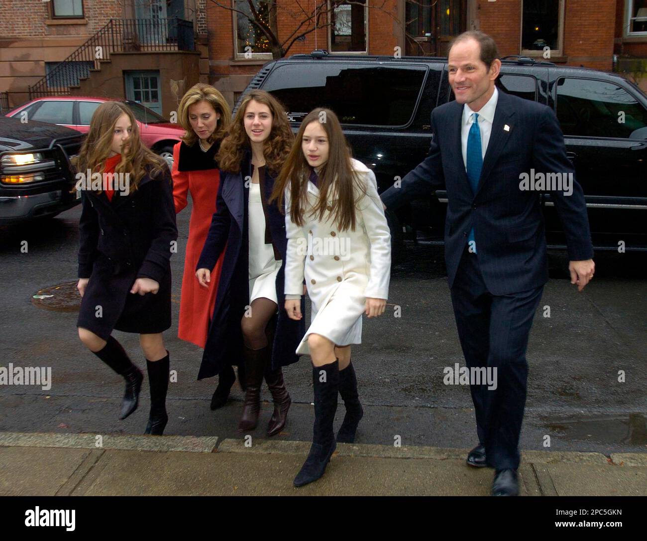 New York Gov. Eliot Spitzer, right, arrives for a church service in ...