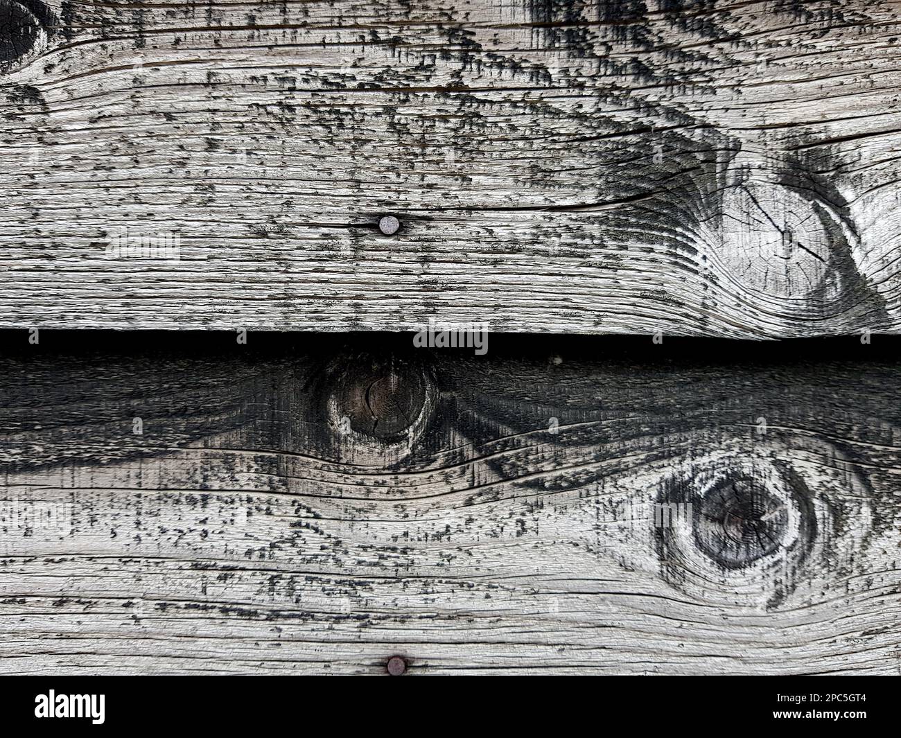 Detail of patterns on old black weatherboard Stock Photo - Alamy