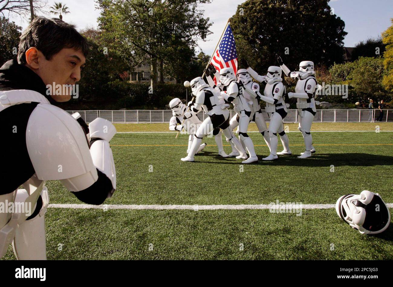Star Wars fans from around the world, dressed as storm troopers, pose ...