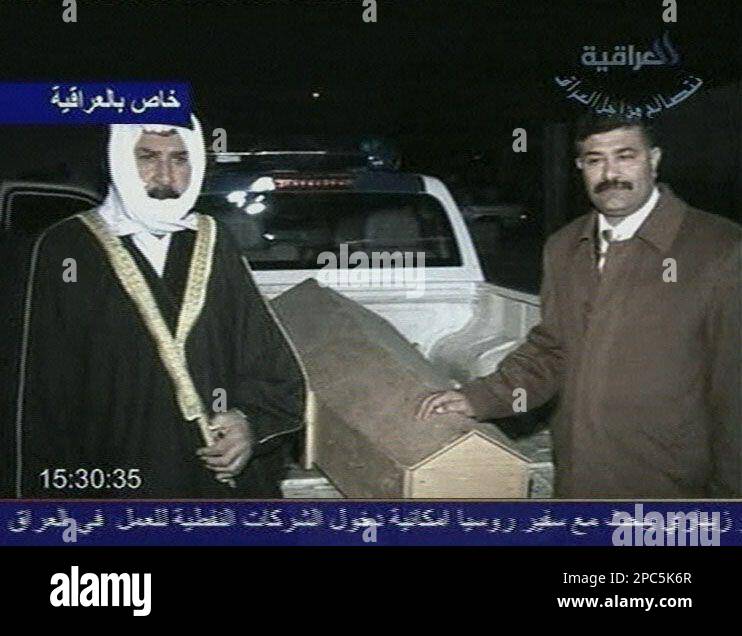This image taken from Al-Iraqiya television Sunday Dec. 31, 2006 shows ...