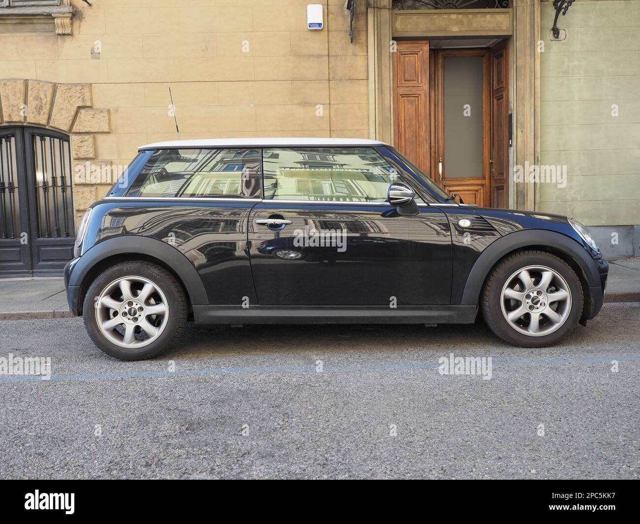 TURIN, ITALY - CIRCA FEBRUARY 2023: black and white Mini cooper car ...