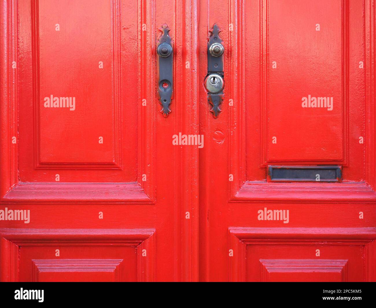 traditional wooden red door in ancient building Stock Photo - Alamy