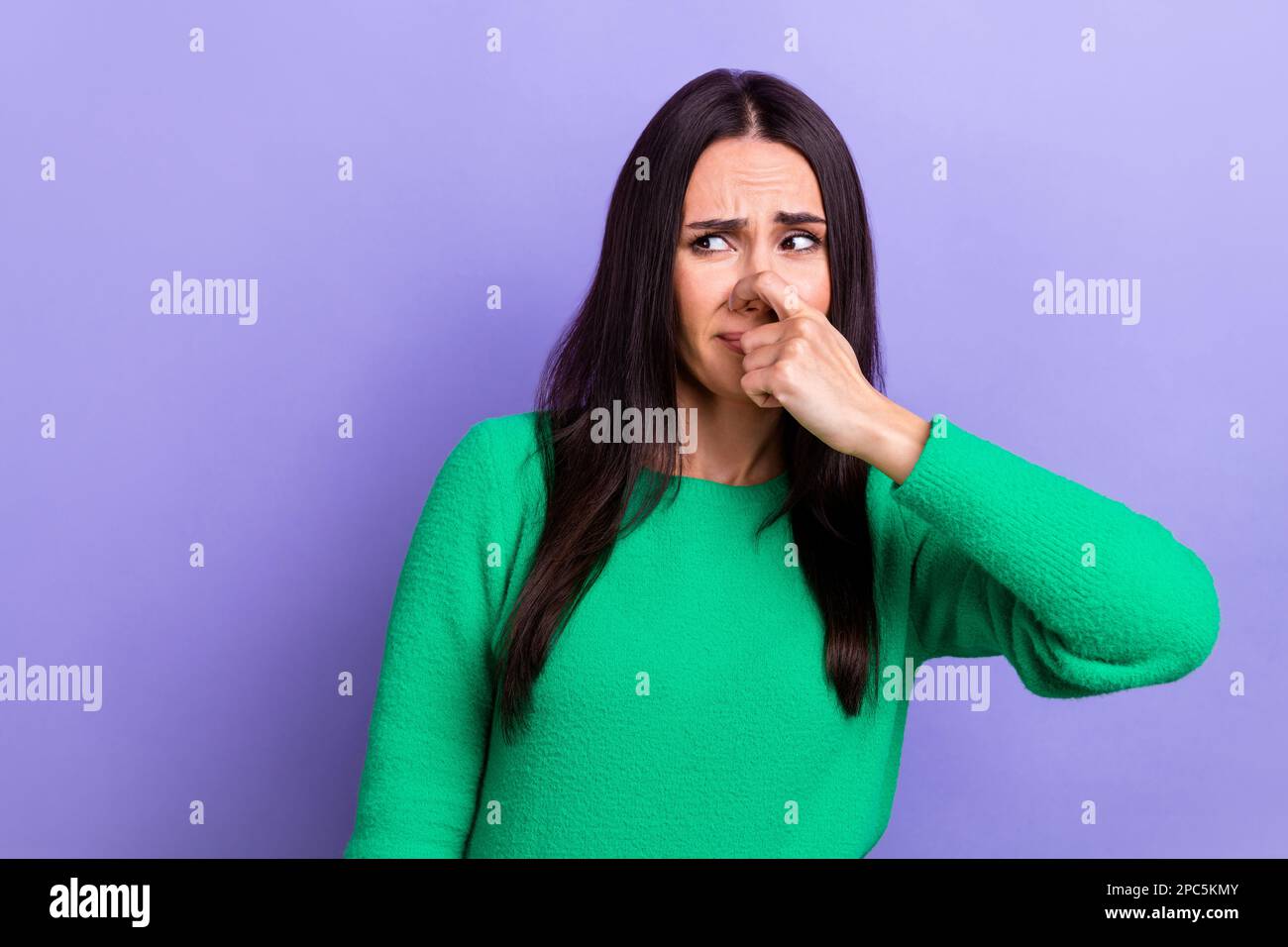 Young woman photo closing her nose look side hear unpleasant smell ...